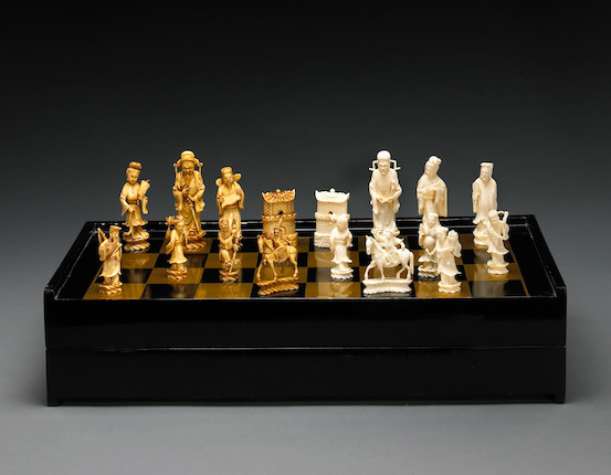 Bonhams A Tinted Ivory Chess Set Mid 20th Century