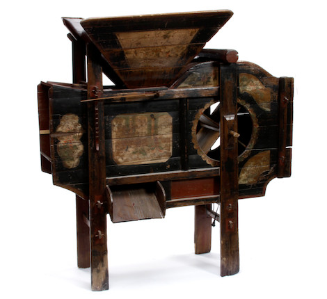 Bonhams : A Japanese painted wood rice mill