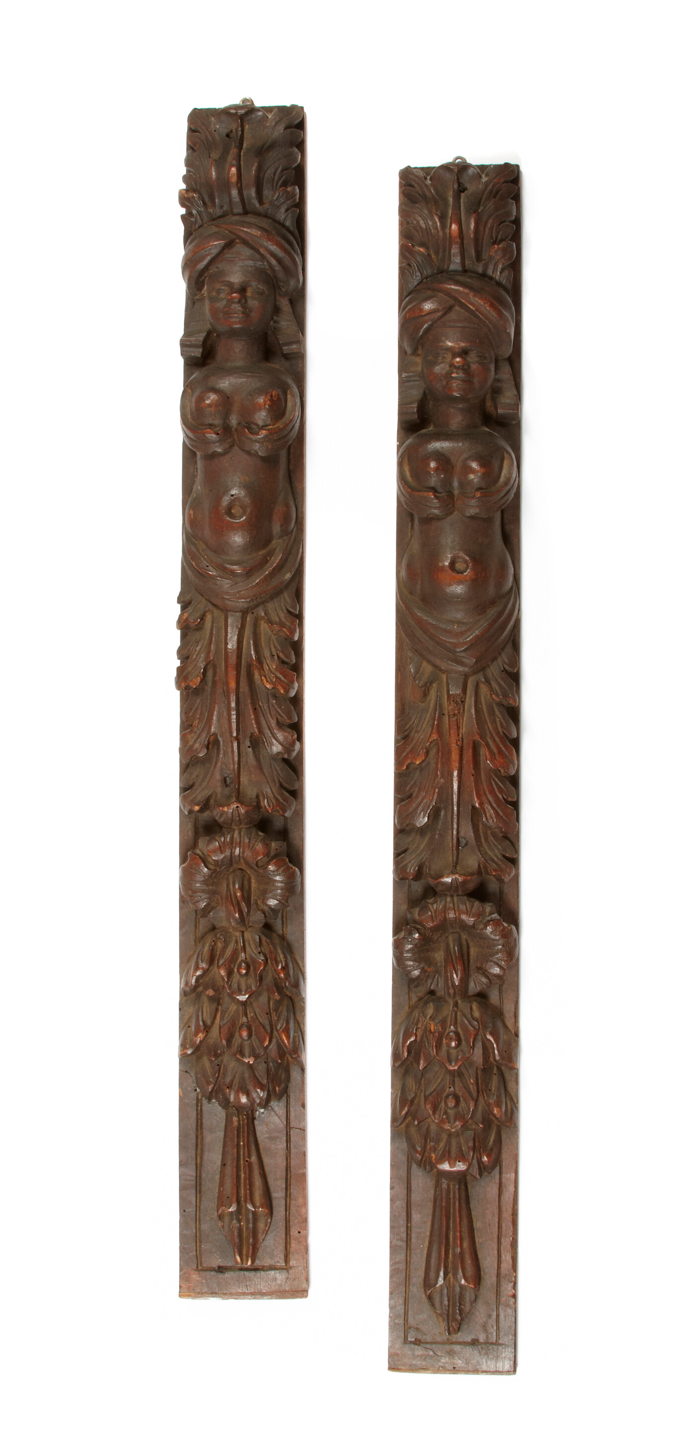 Bonhams : A pair of Continental carved walnut wall panels