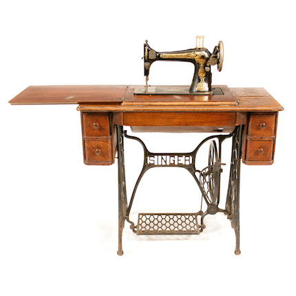 Bonhams : An early iron and oak Singer sewing table