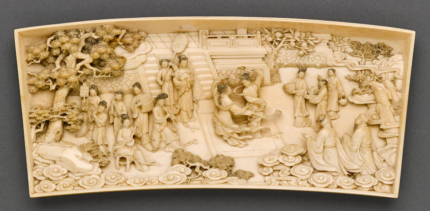Bonhams : A carved ivory plaque with dancers and musicians with stand ...