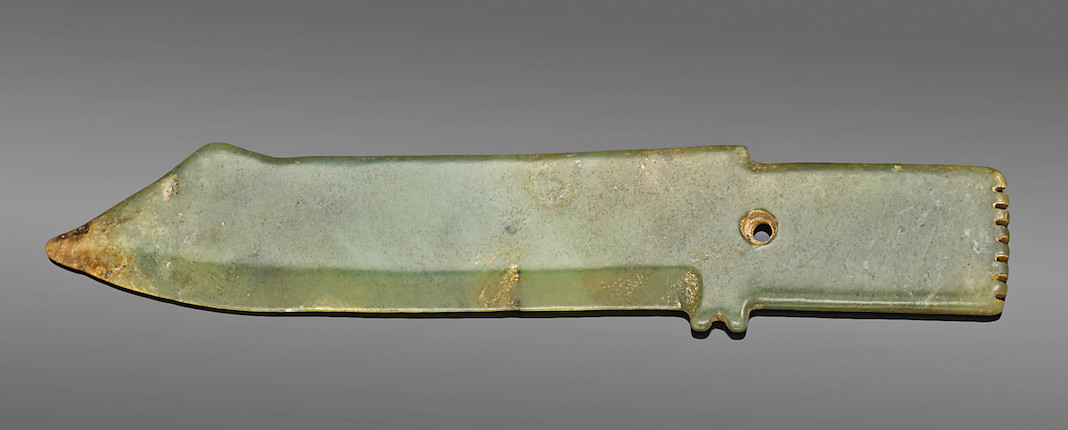 Bonhams : An archaistic green jade dagger Late Qing dynasty