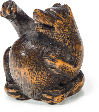 Bonhams : A wood netsuke of a tanuki (raccoon dog) By Masayuki, Edo ...