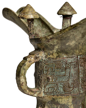 Bonhams : TWO ARCHAIC BRONZE RITUAL WINE VESSELS, GU AND JUE Shang ...