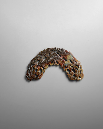 Bonhams : AN OPENWORK ARCHAISTIC JADE HUANG PENDANT Late Qing Dynasty