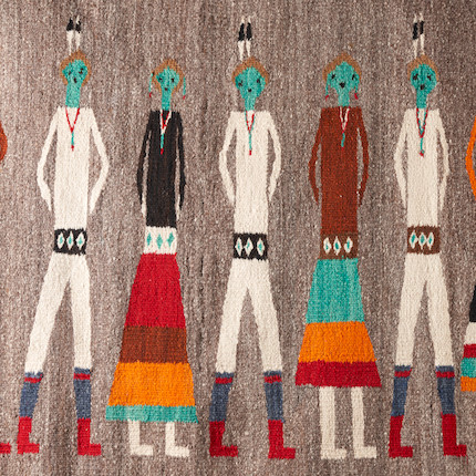 Bonhams Skinner : A Diné (Navajo) Yeibichai dancers weaving 47 x 78 in.