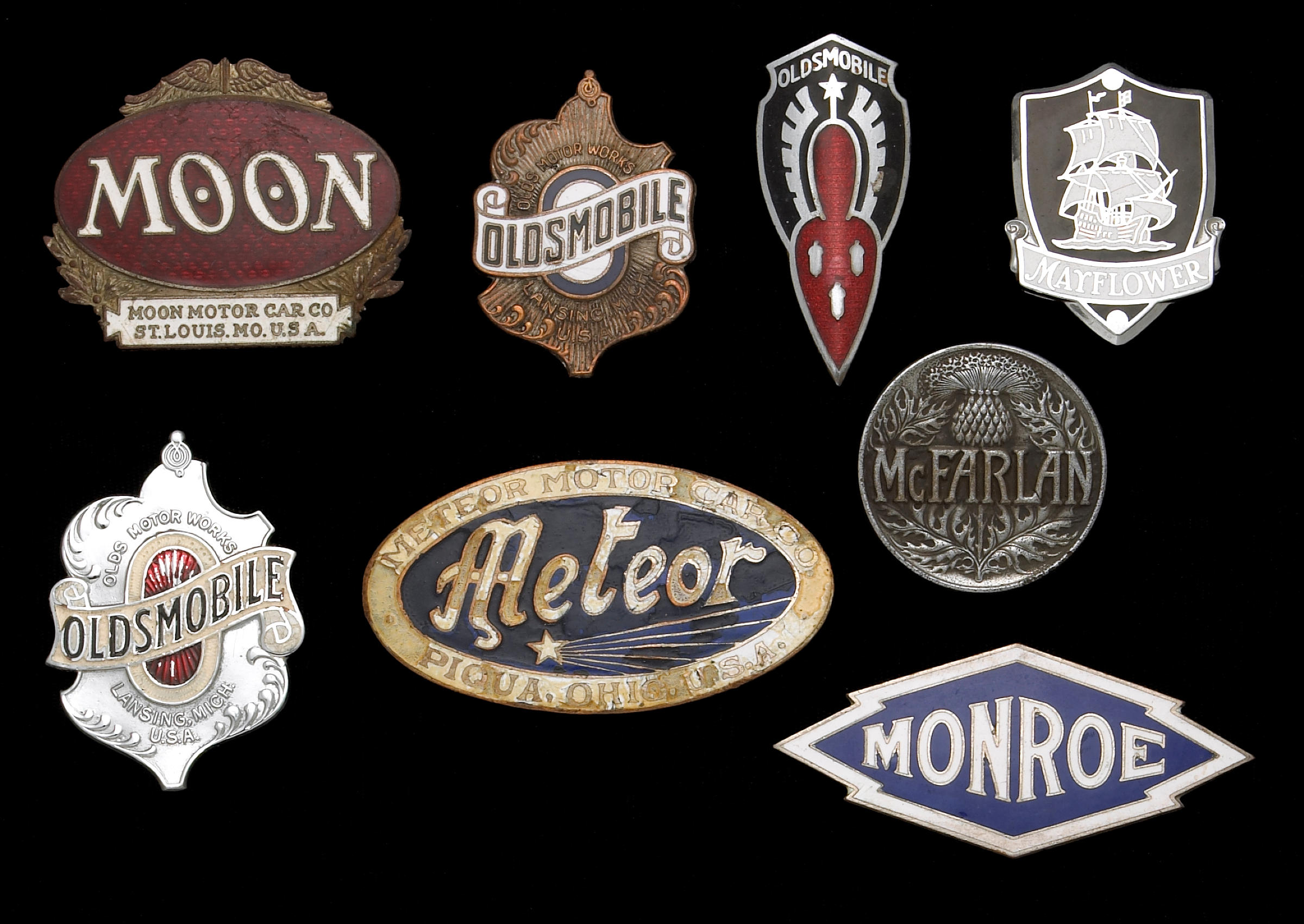 Bonhams Cars A Group Of Eight Motor Vehicle Emblems