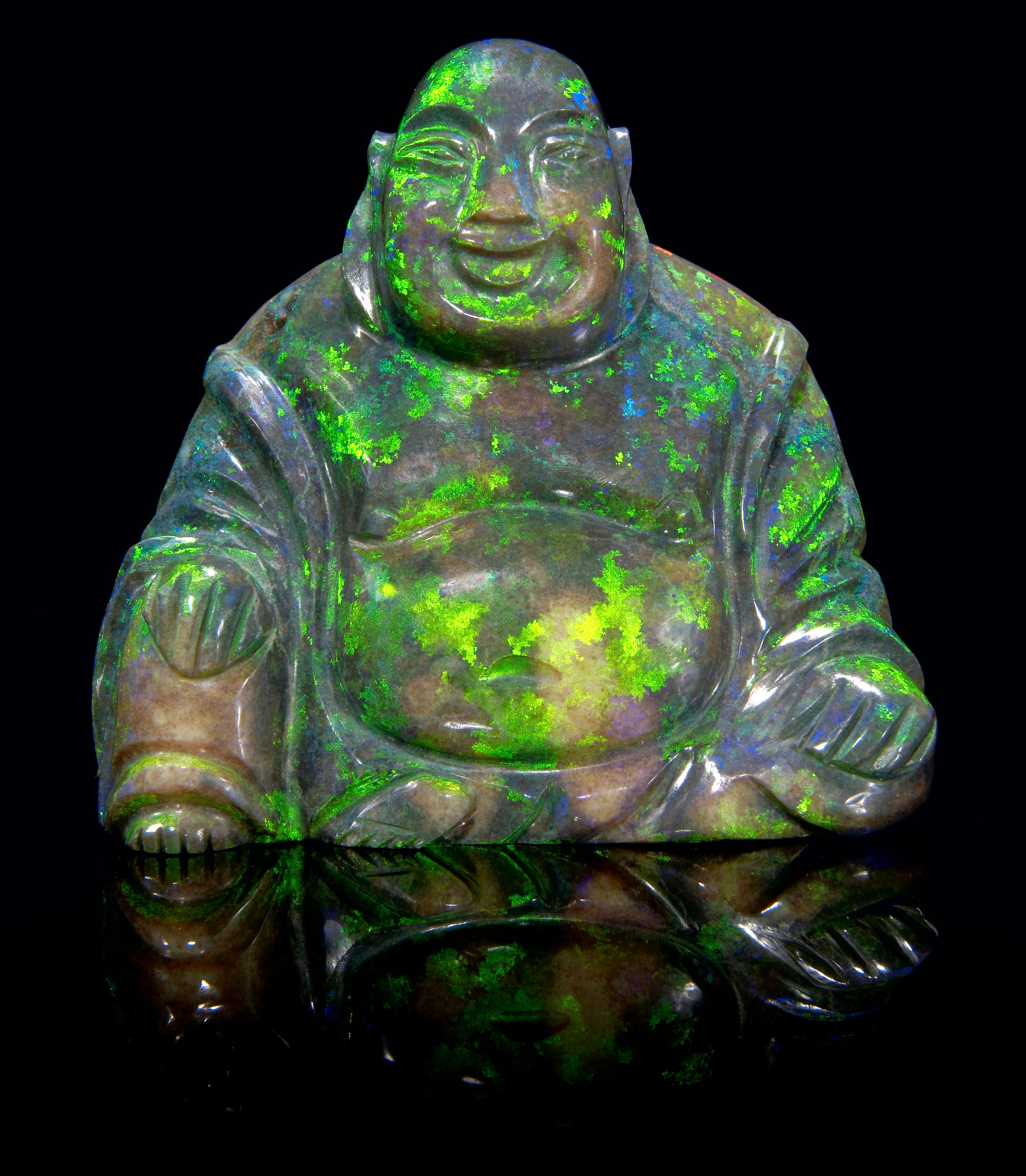 Bonhams : Carved Matrix Opal Buddha