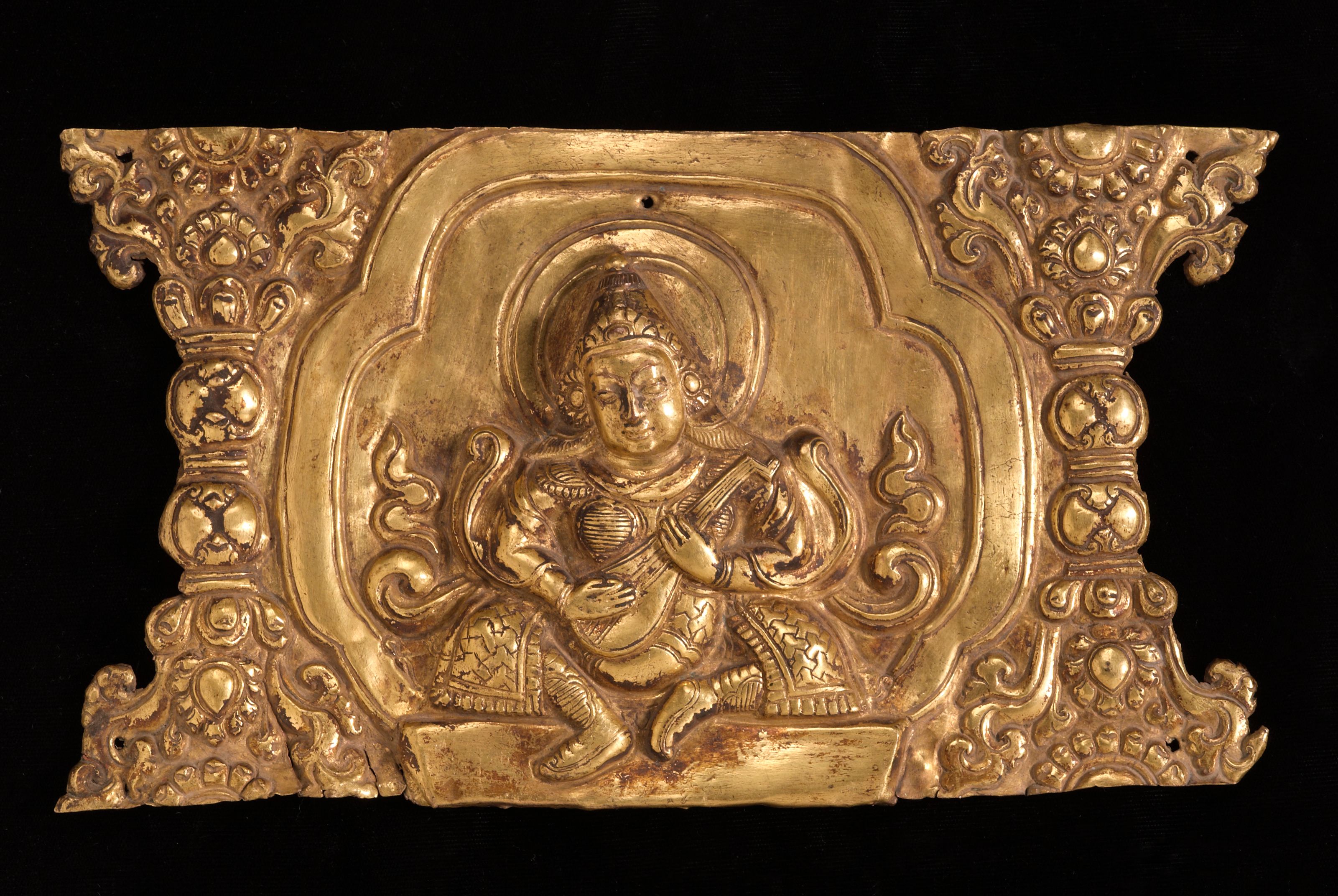 Bonhams : A Tibetan gilt copper repoussé plaque of a Buddhist guardian ...
