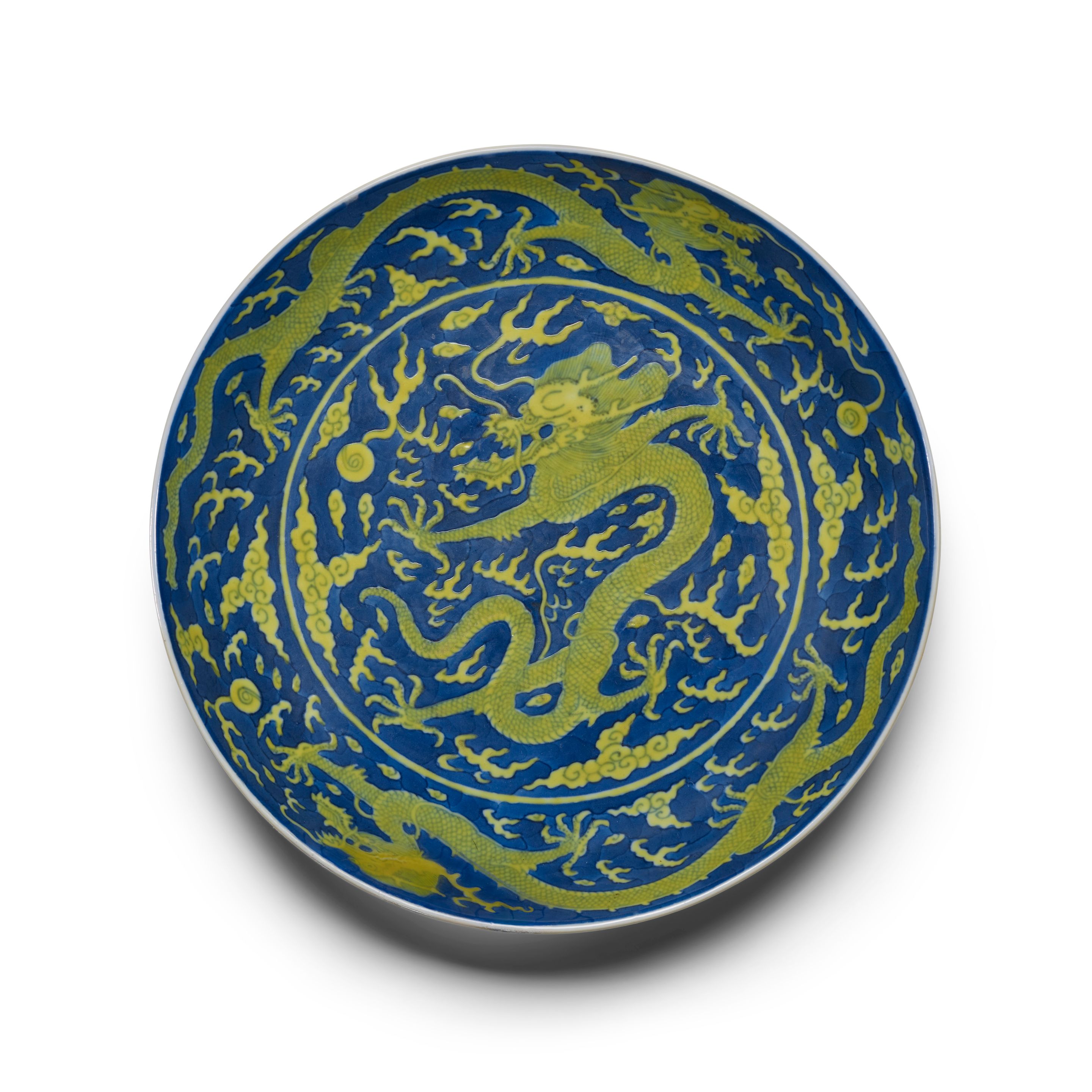 Bonhams : AN UNDERGLAZE-BLUE AND YELLOW-ENAMELED 'DRAGON' DISH Daoguang ...