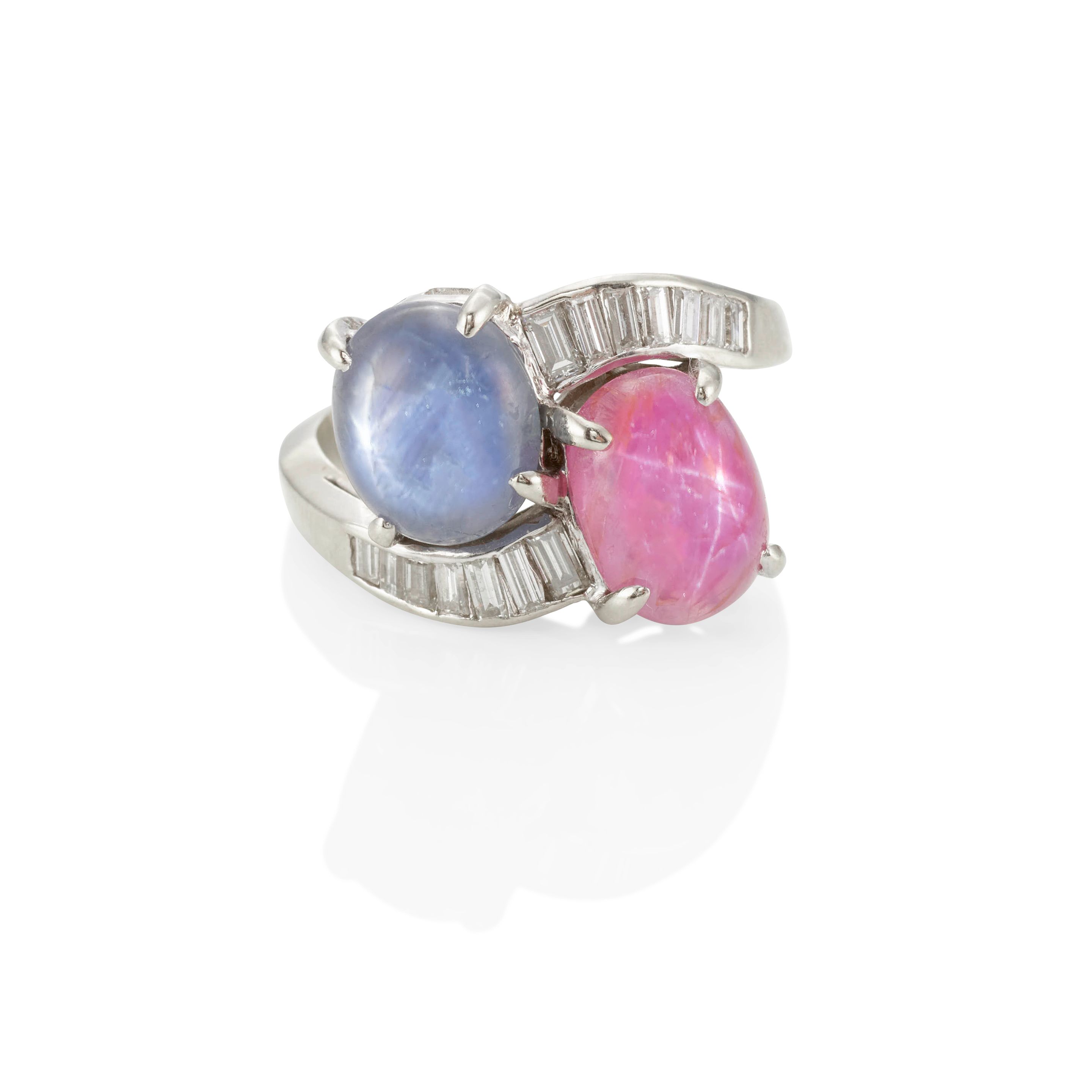Bonhams : A 14K WHITE GOLD, STAR SAPPHIRE, STAR RUBY AND DIAMOND RING