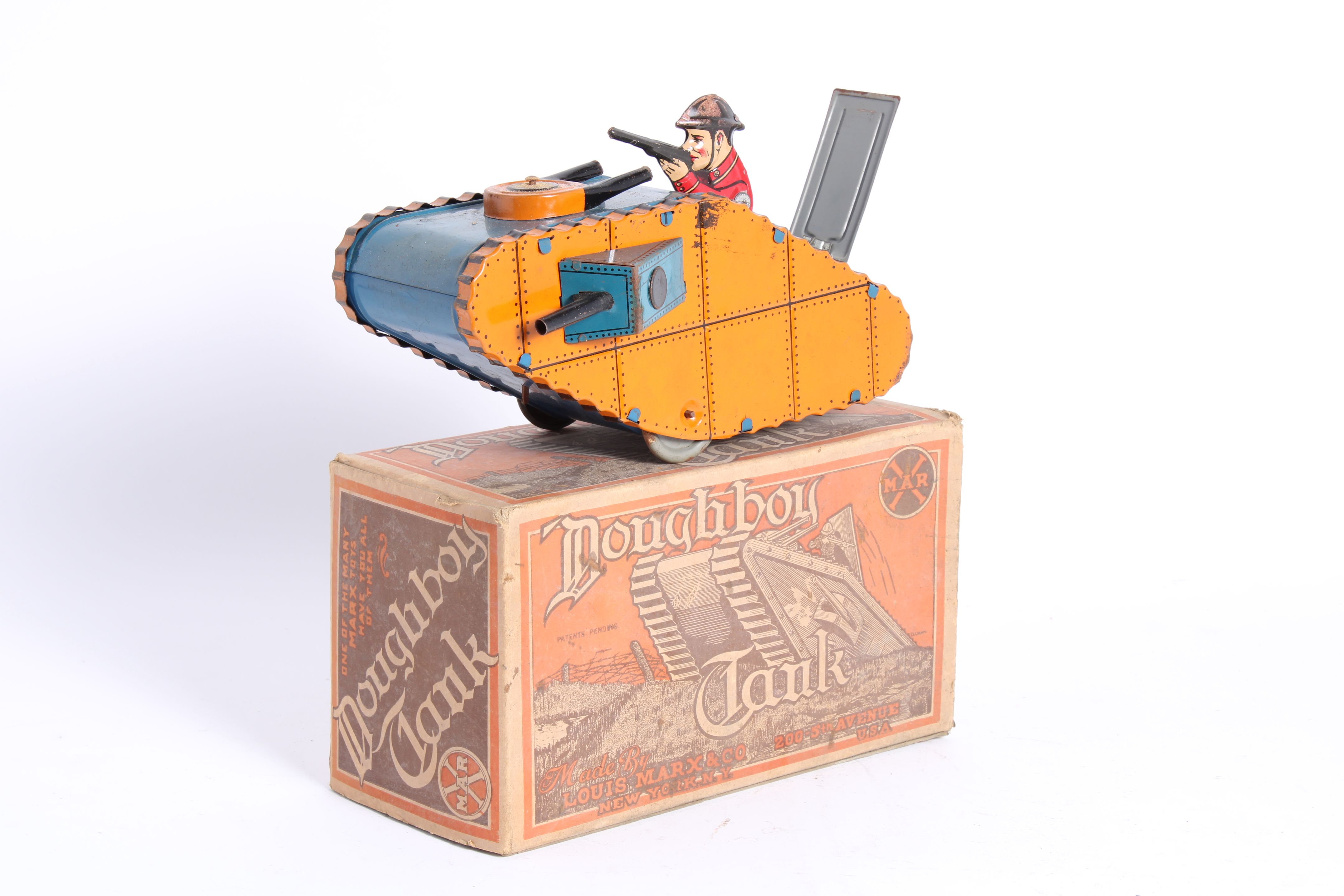 Bonhams Cars : A boxed Doughboy Tank by Marx, American, 1930s, (2)