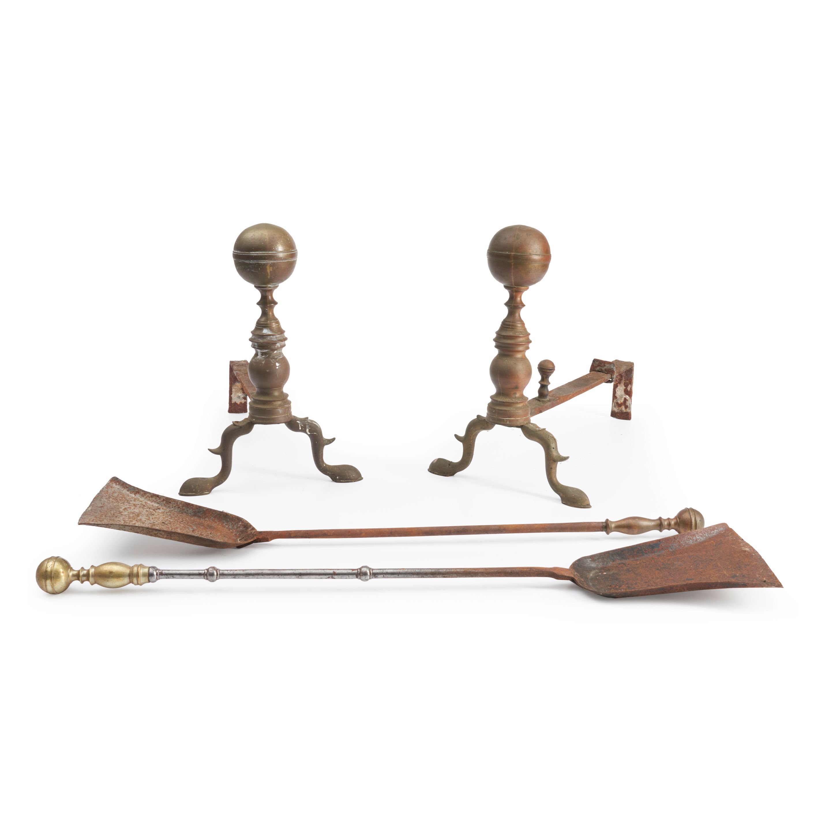 Bonhams Skinner : Pair of Brass Ball-top Andirons and Two Shovels