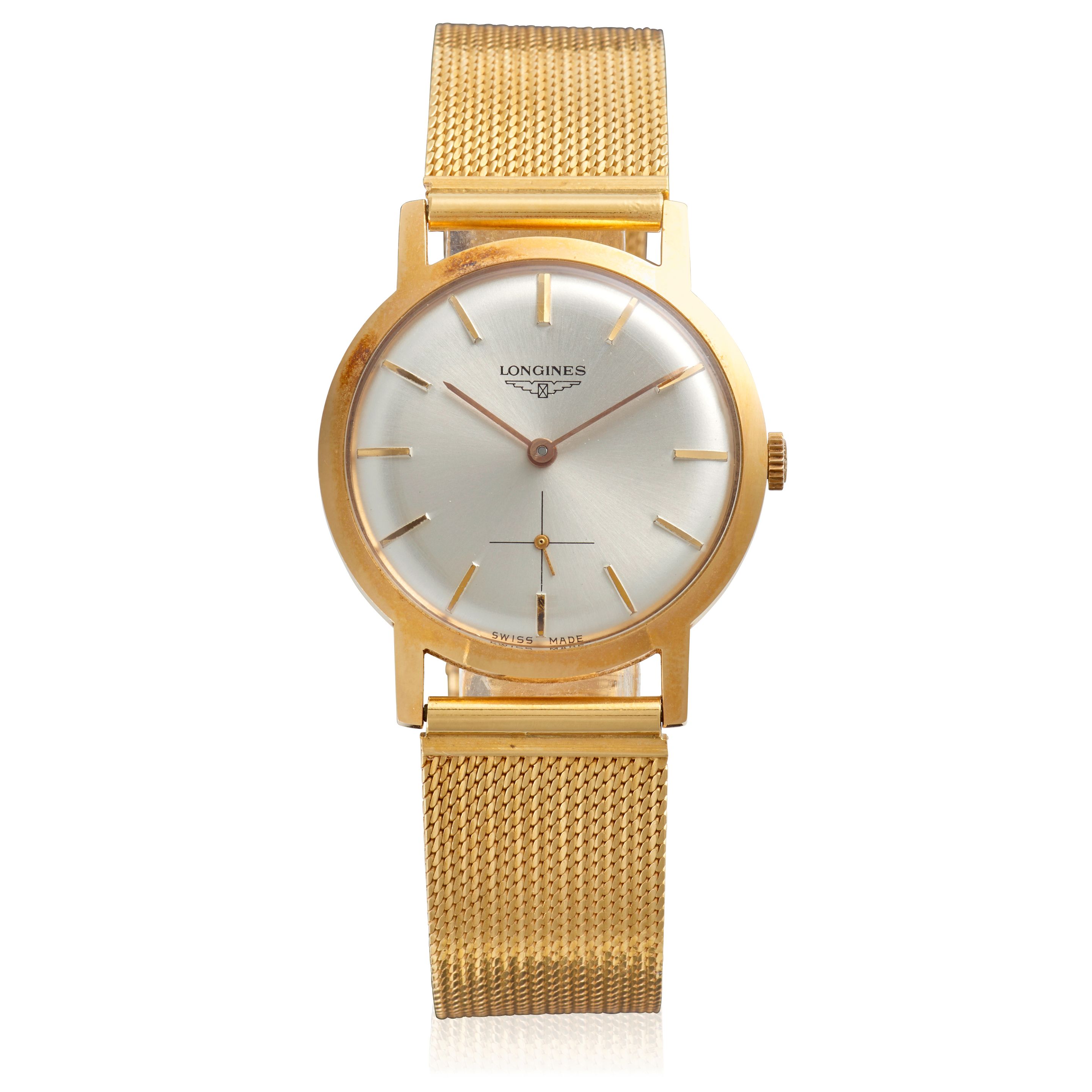 Bonhams : LONGINES. AN 18K GOLD MANUAL WIND BRACELET WATCH