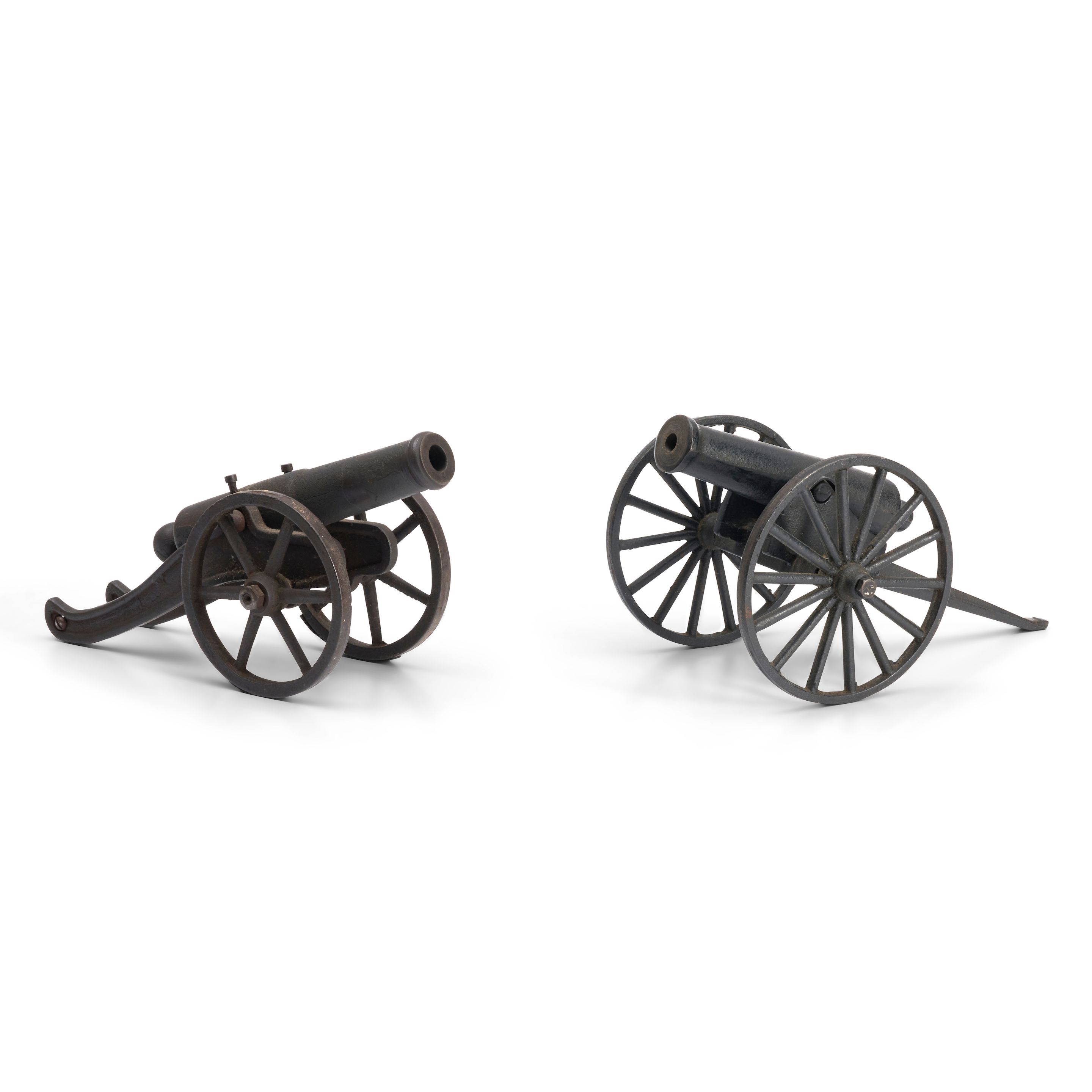 Bonhams Skinner : Two Miniature Cast-iron Field Guns