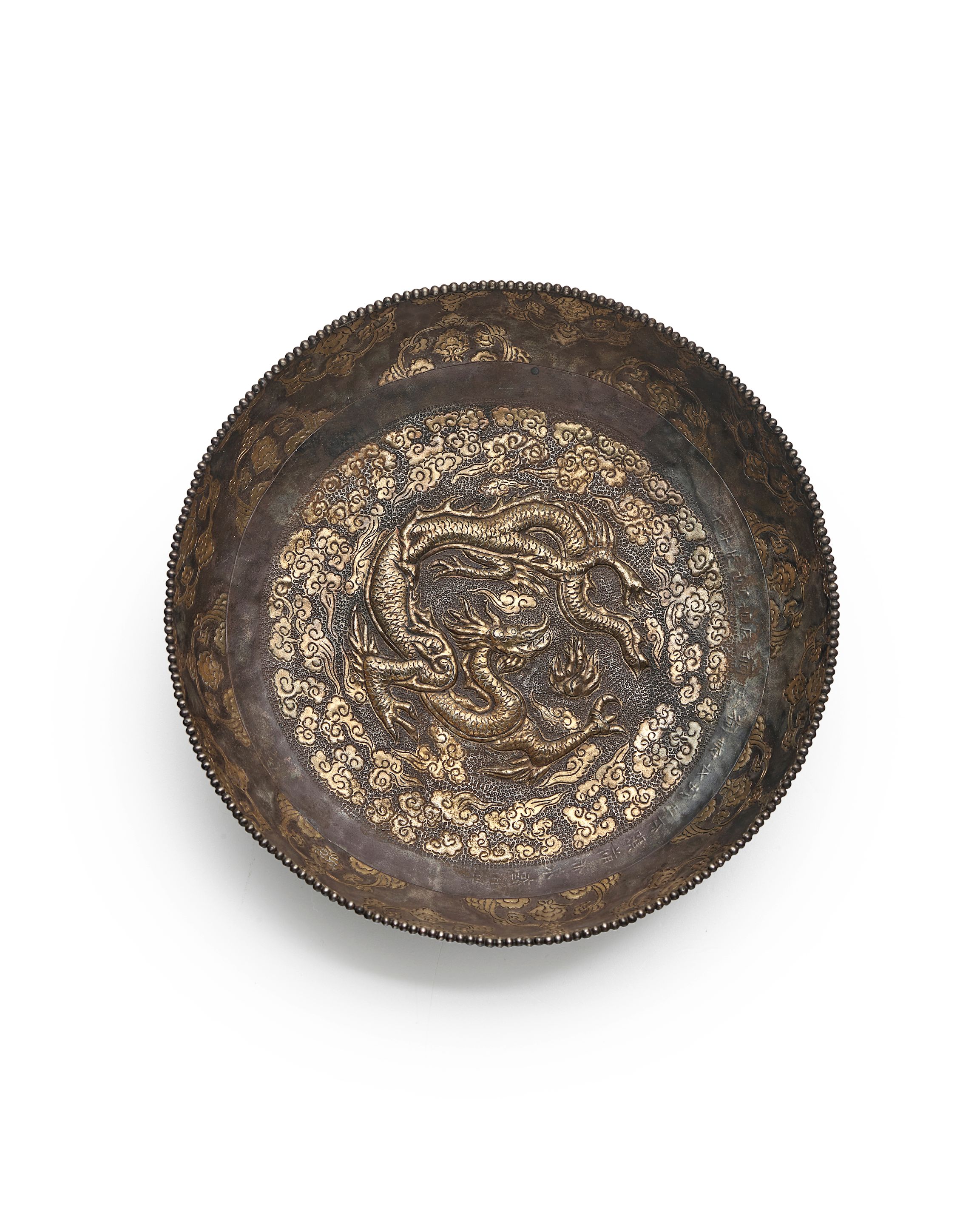 Bonhams : A PARCEL-GILT AND REPOUSSÉ SILVER 'DRAGON' BOWL Liao Dynasty ...