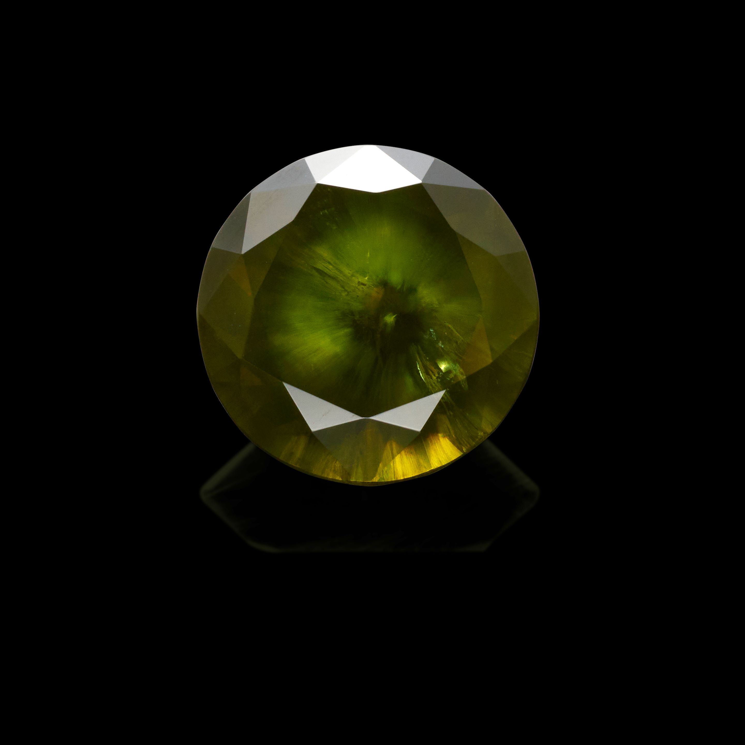 Bonhams : Demantoid Garnet with Horsetail Inclusions