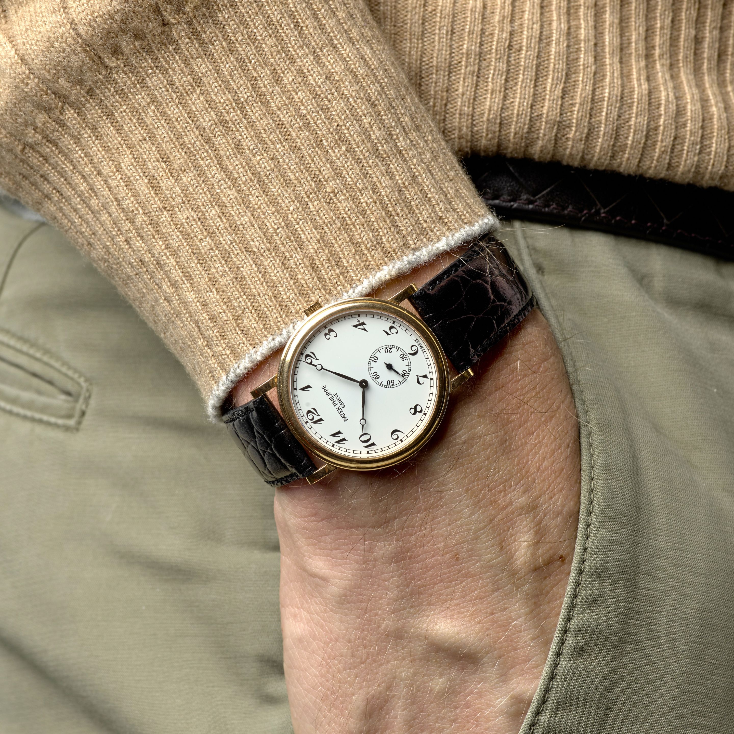 Bonhams : PATEK PHILIPPE. AN 18K GOLD MANUAL WIND WRISTWATCH Calatrava ...