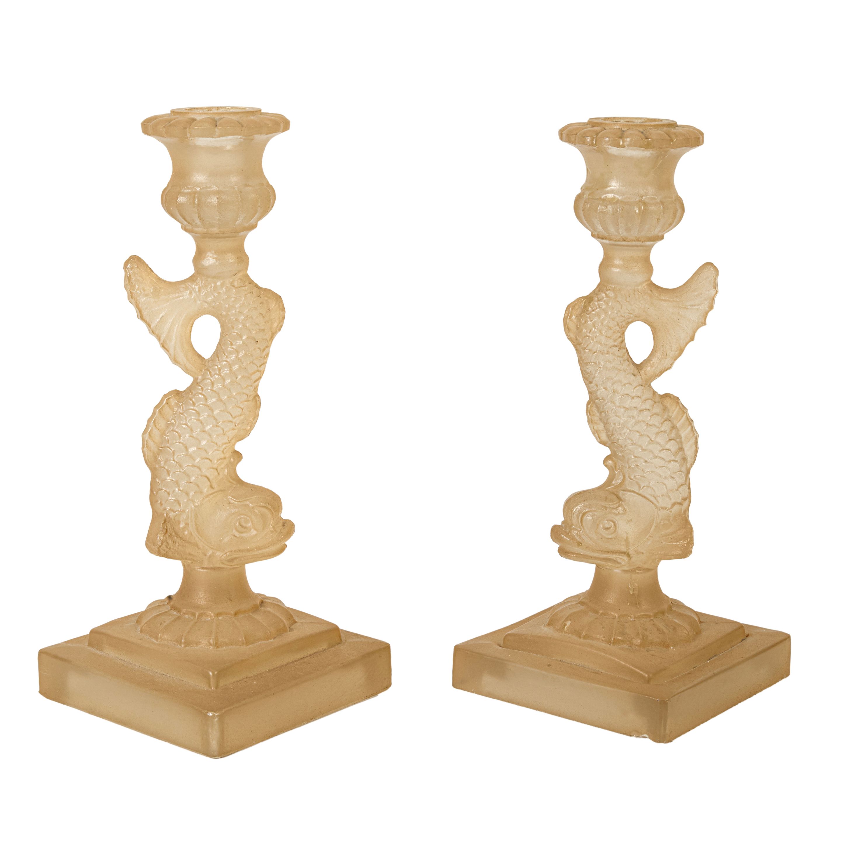 Bonhams : A PAIR OF AMERICAN PRESSED GLASS DOLPHIN CANDLESTICKSSandwich ...