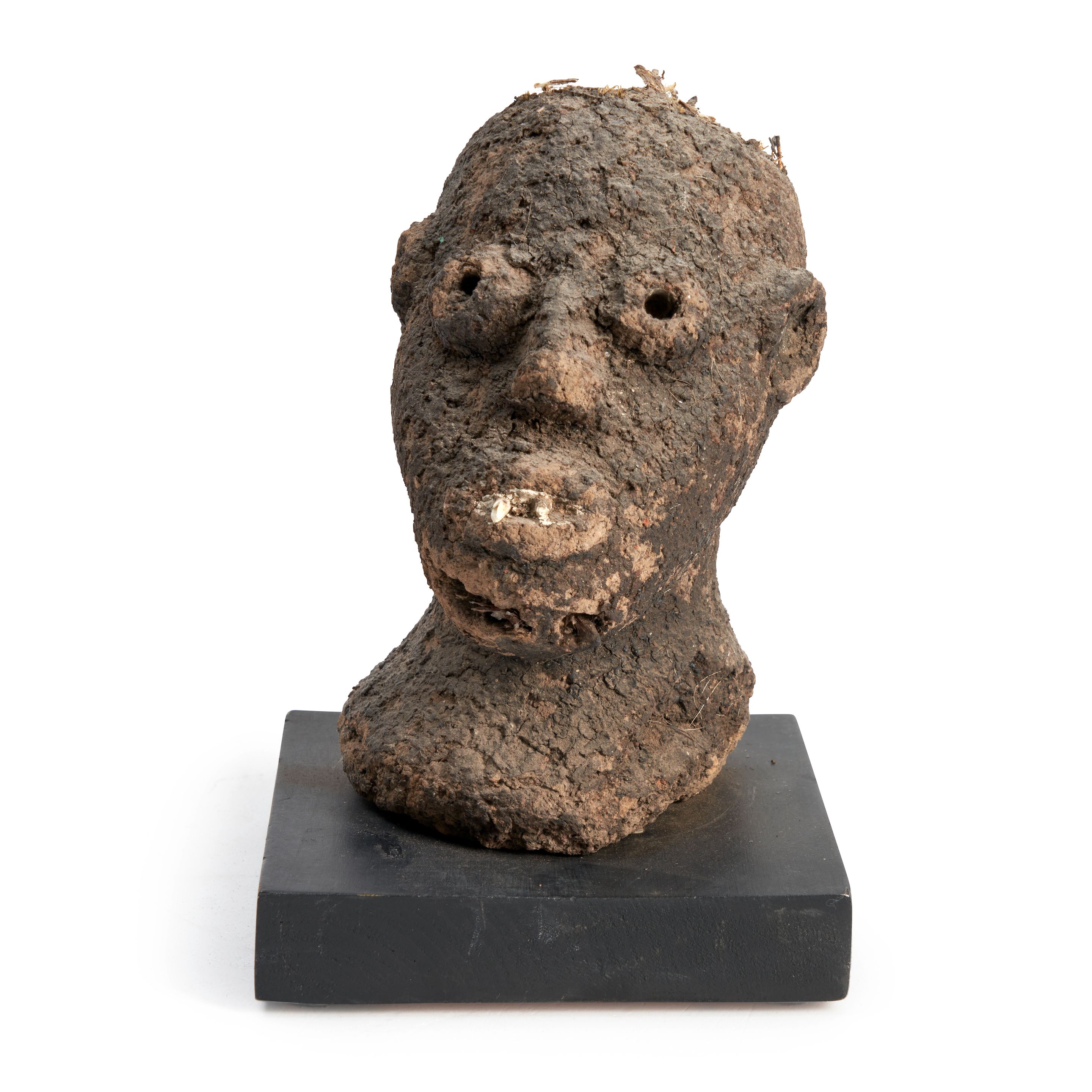 Bonhams Skinner : A Nigerian stone fetish head ht. 8 in.
