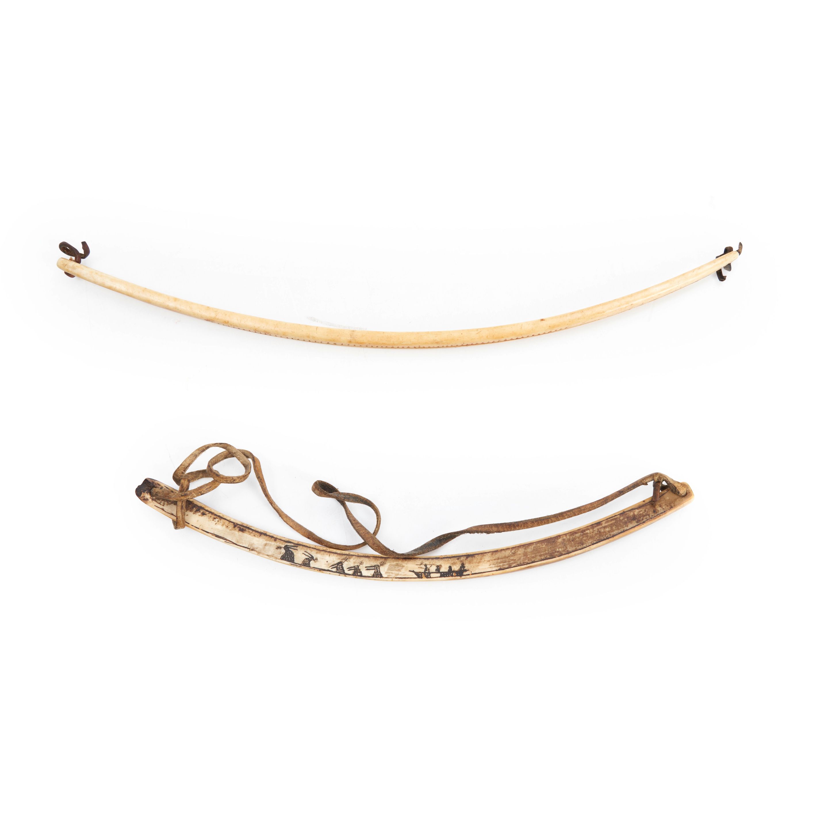 Bonhams Skinner : Two Inuit bow drills lg. 15 1/2, and 12 in.