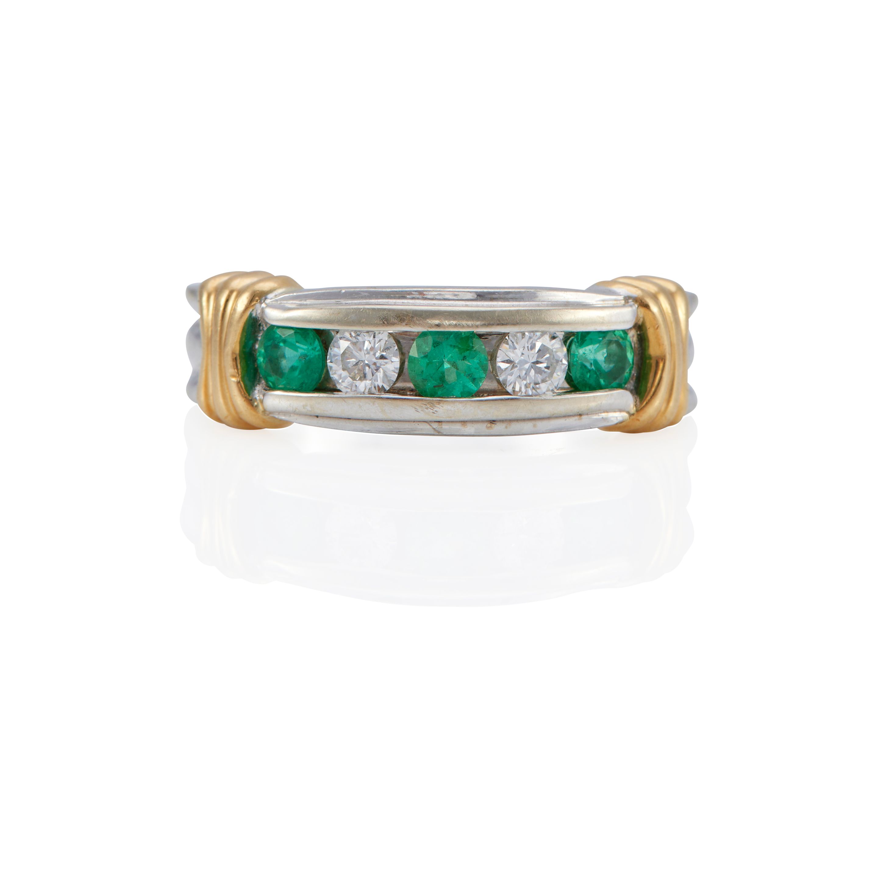 Bonhams : AN 18K BI-COLOR GOLD, DIAMOND AND EMERALD RING