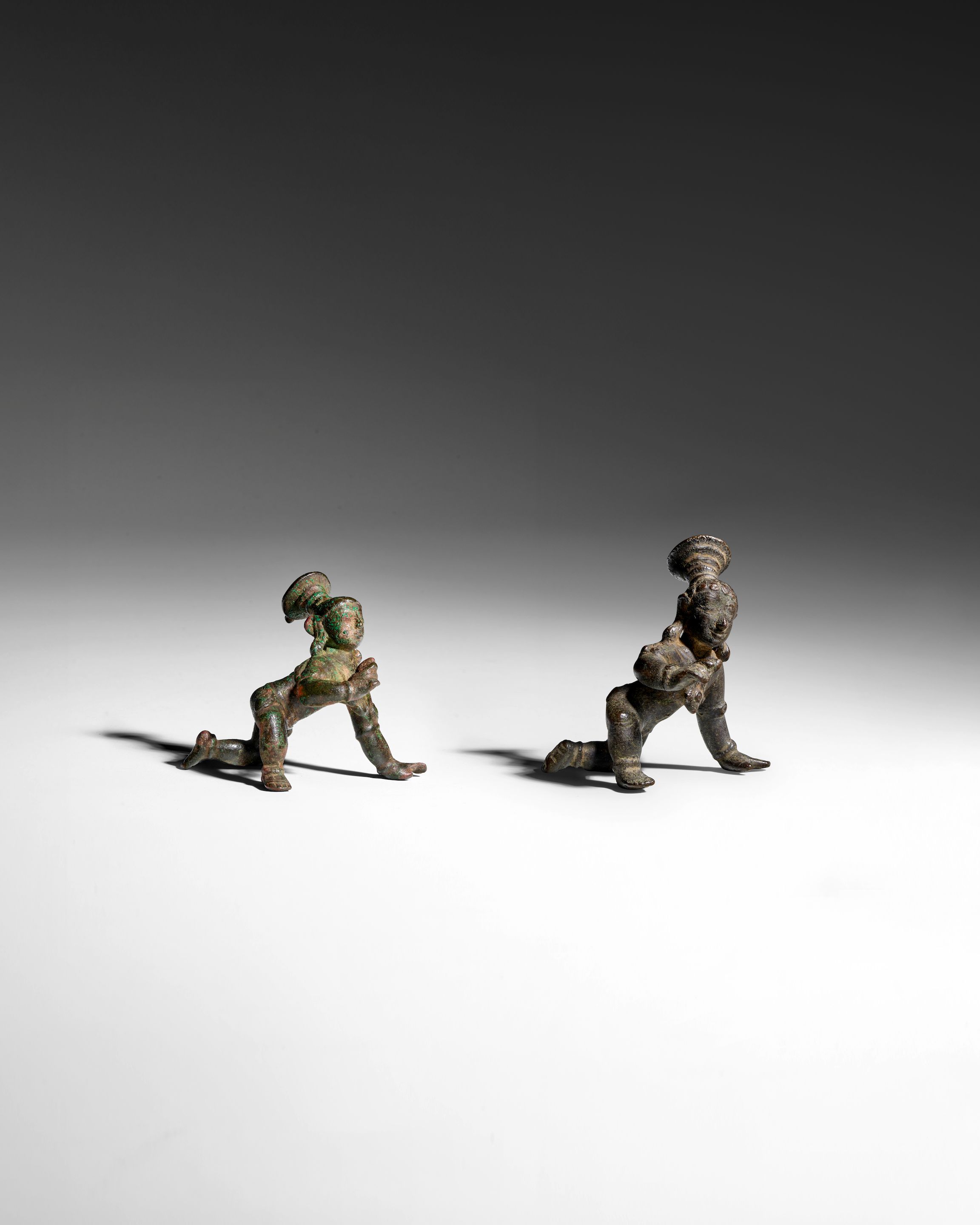 Bonhams : TWO COPPER ALLOY FIGURES OF KRISHNA, THE BUTTER THIEF SOUTH INDIA, VIJAYANAGARA PERIOD ...