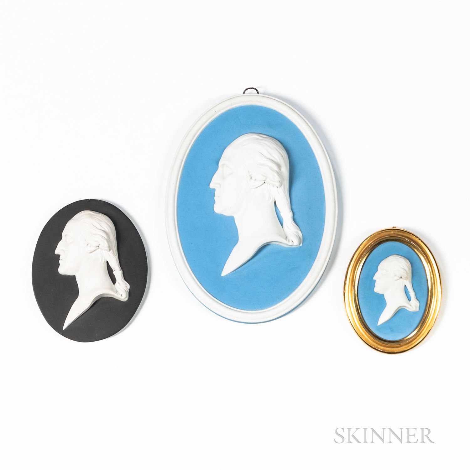 Bonhams Skinner : Three Wedgwood Solid Jasper Washington Portrait Plaques