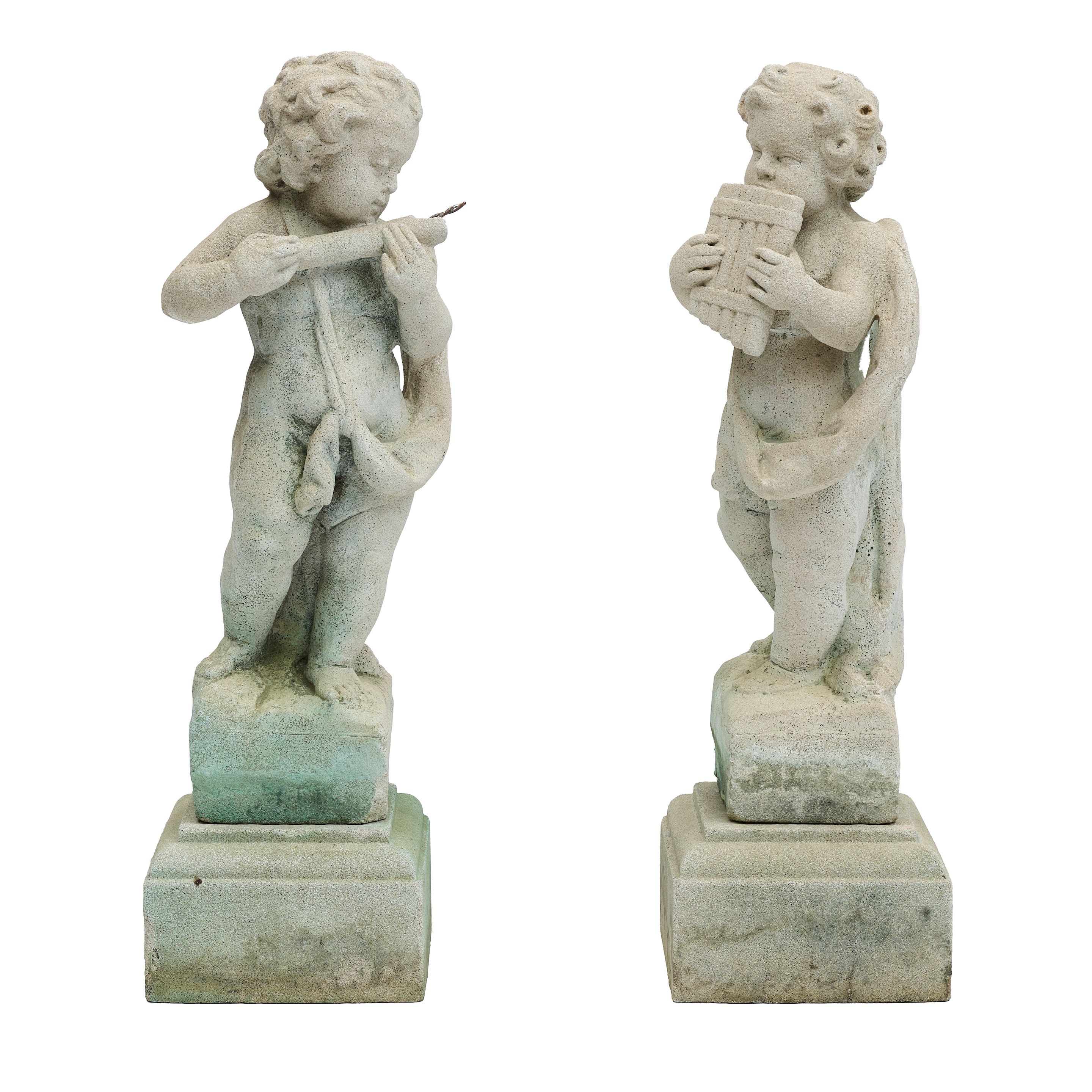 Bonhams : A PAIR OF CAST STONE GARDEN FIGURES OF PUTTI PLAYING ...