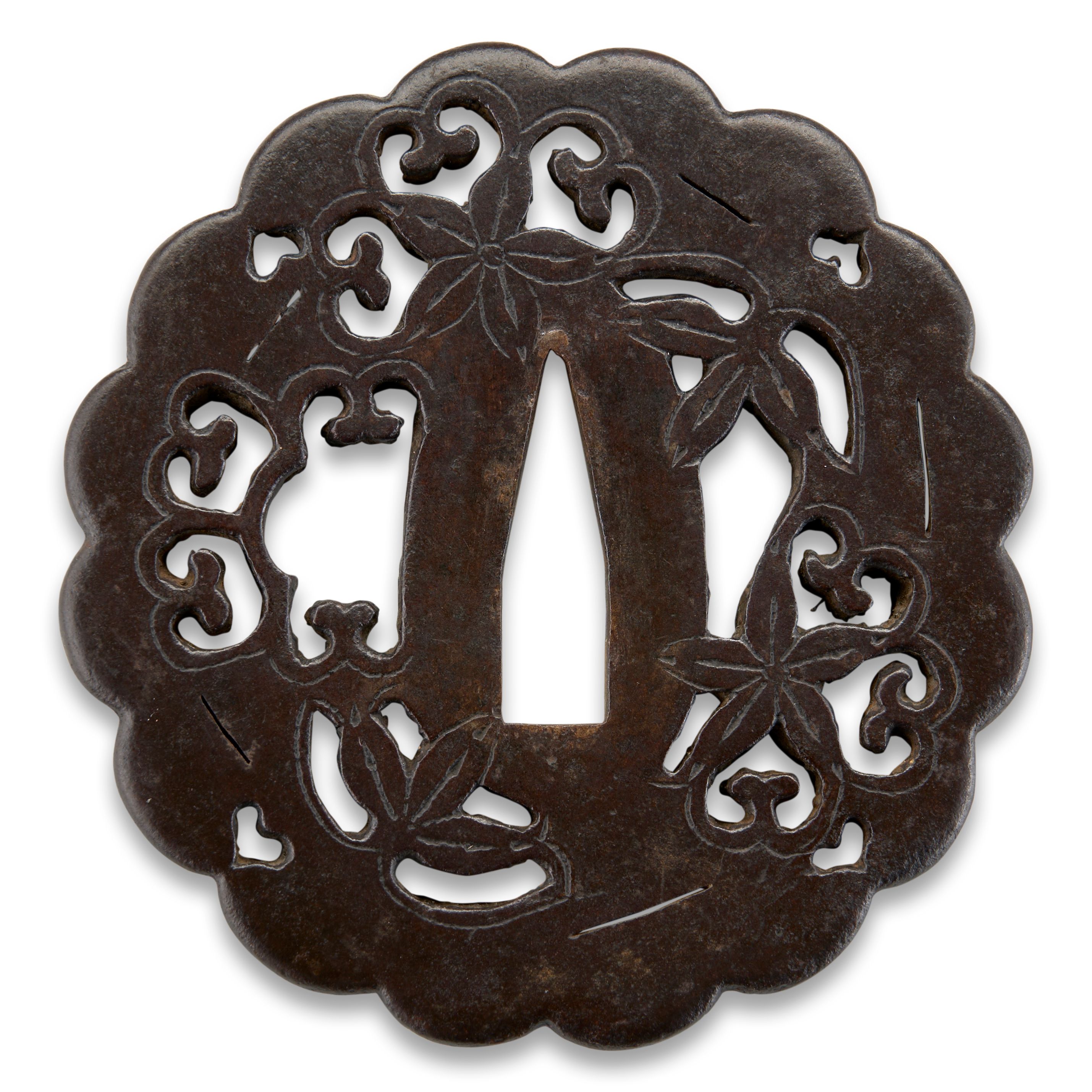 Bonhams Skinner : AN IRON HIGO KAMIYOSHI OPENWORK TSUBA WITH FLOWERS ...